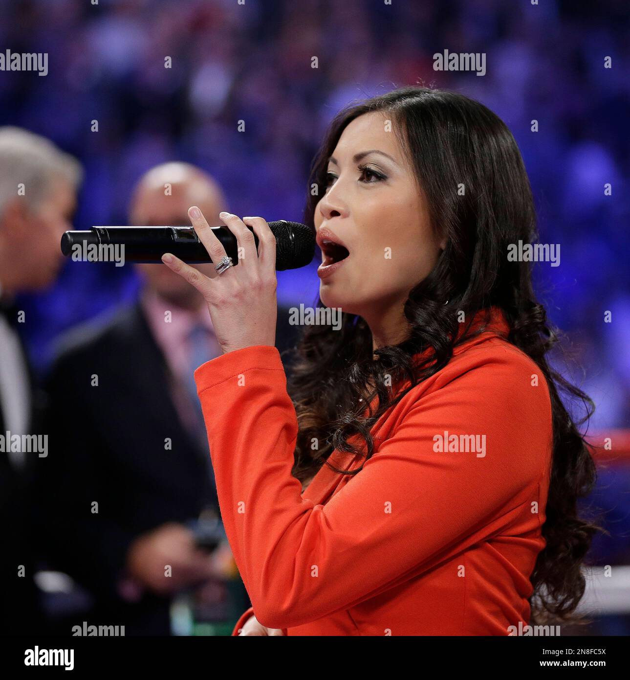 Singer Chelsea Emata sings the Philippine national anthem before the ...
