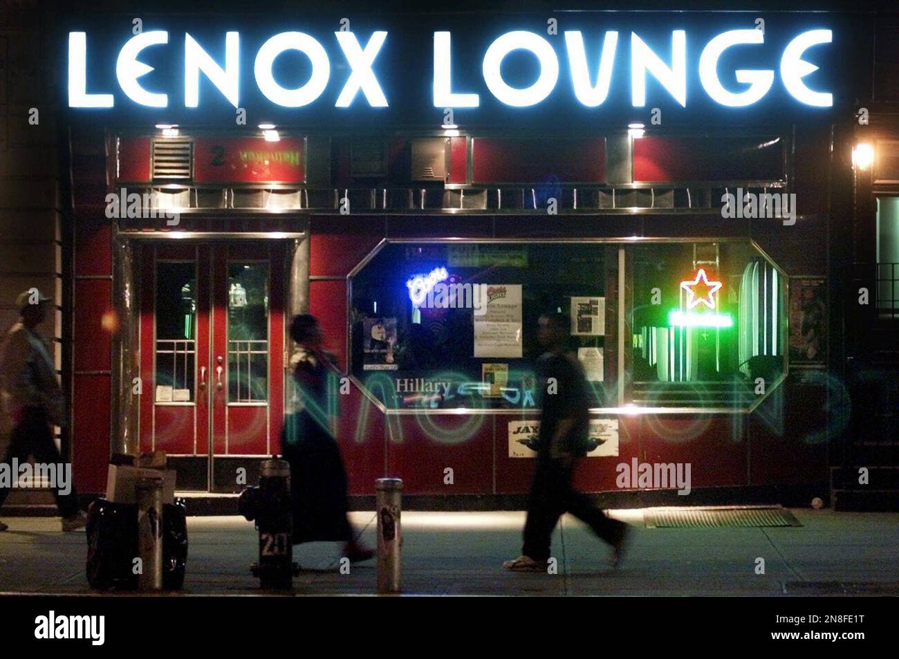 FILE - In this Oct. 19, 2000 file photo, pedestrians pass by the Lenox ...