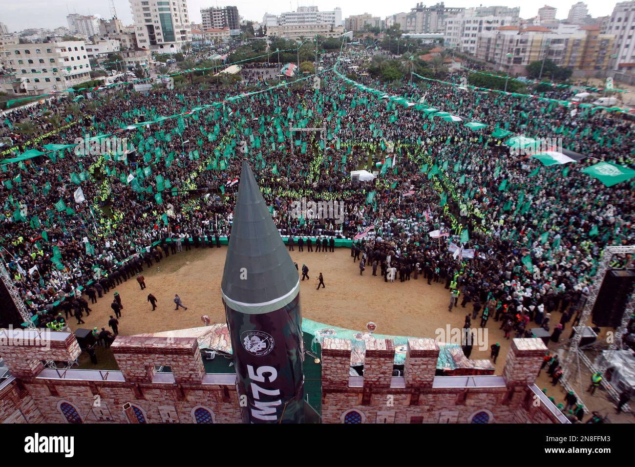 A large model of a M75 long range rocket is seen as thousands of Hamas ...