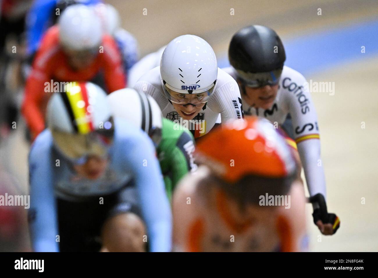 Laura Suessemilch of Germany, center, competes in the women's points ...