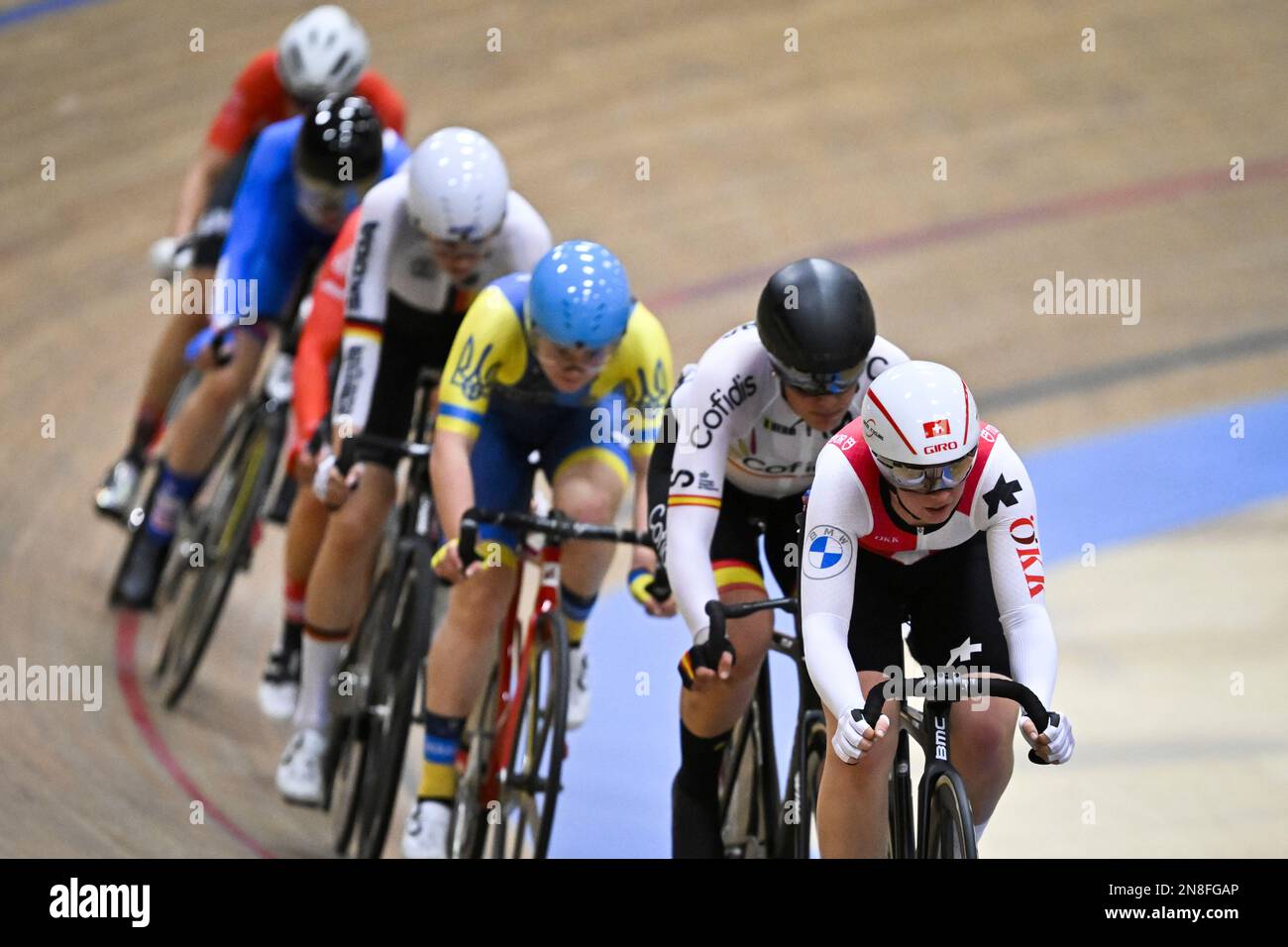Lena Mettraux of Switzerland, right, competes in the women's points ...