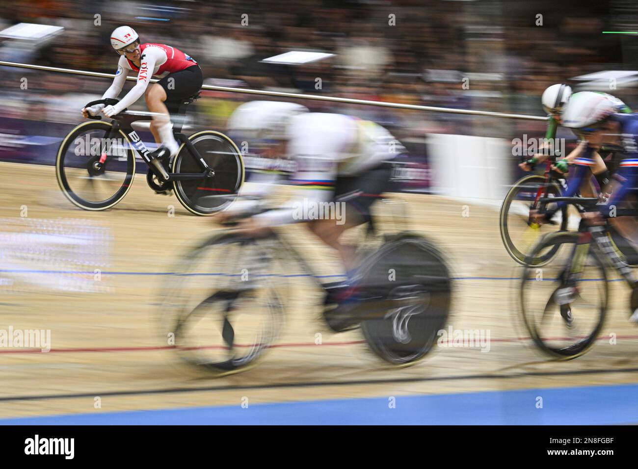 Lena Mettraux of Switzerland, left, competes in the women's points race ...