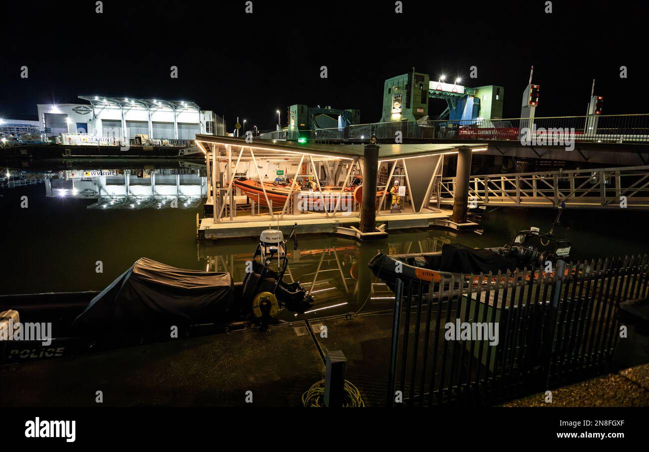 RNLI Lifeboats in glass lifeboat station in Poole Harbour, Dorset, UK ...