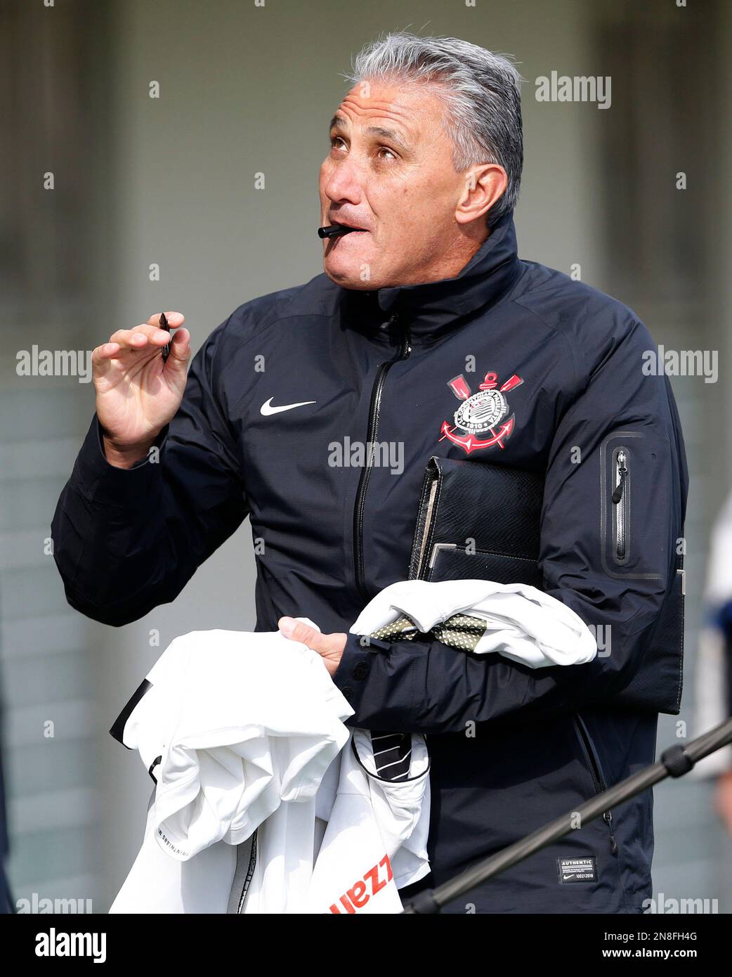Corinthians' coach Tite signs his autographs for fans during Brazilian ...