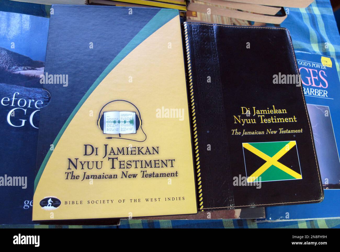 In this Dec. 3, 2012 photo, the covers of two editions of the new ...