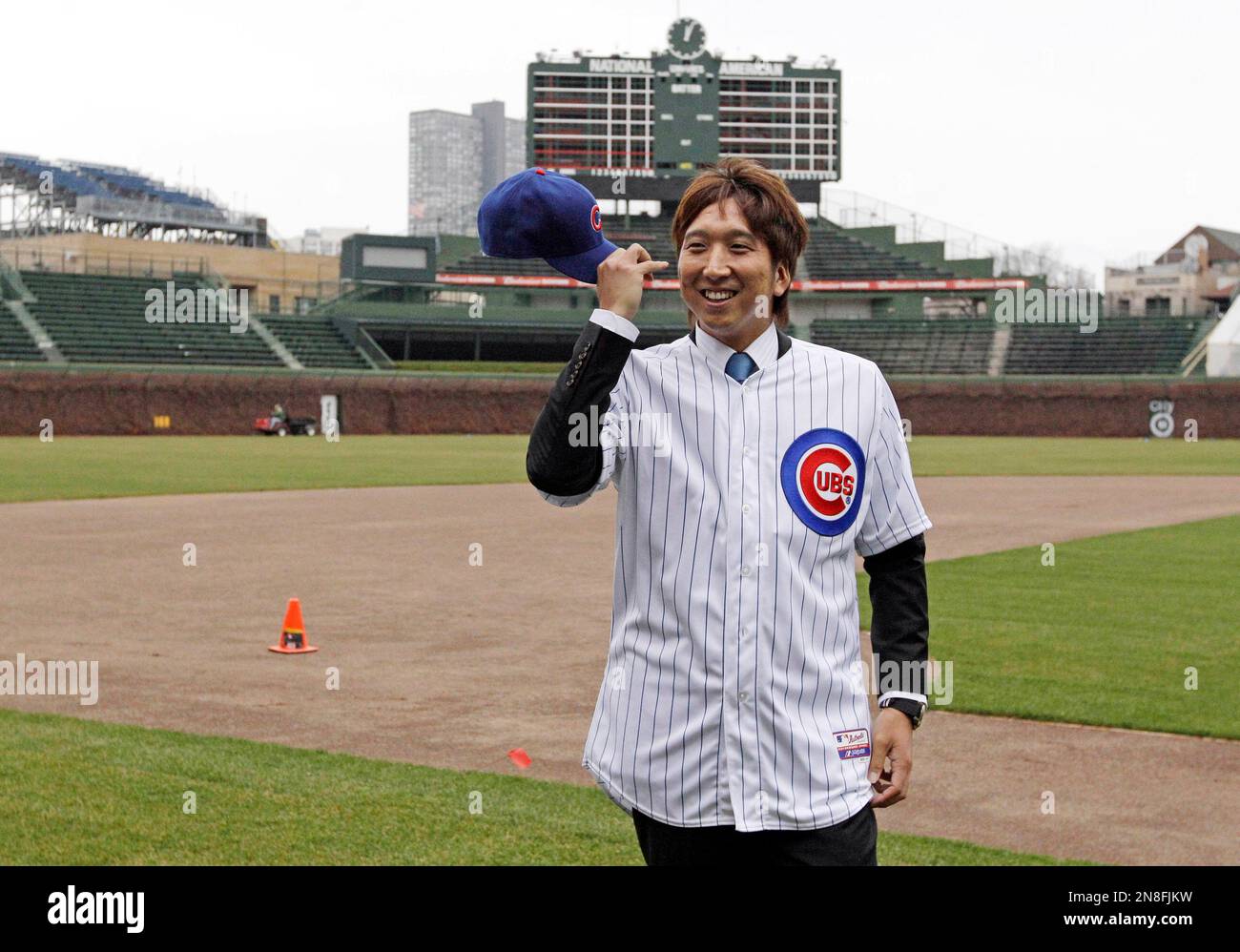 Chicago Cubs pitcher Kyuji Fujikawa, of japan, poses for photos at ...