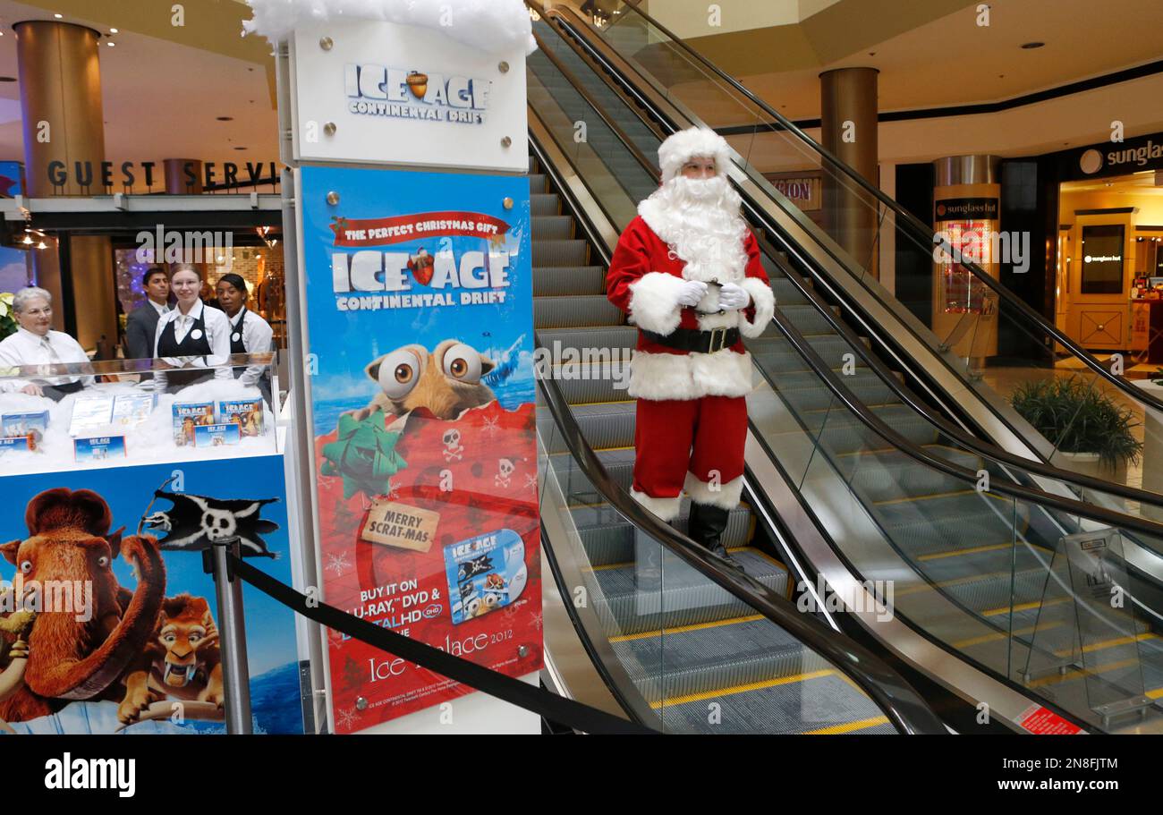 A signing Santa Claus celebrates the December 11th Blu-ray, DVD and ...