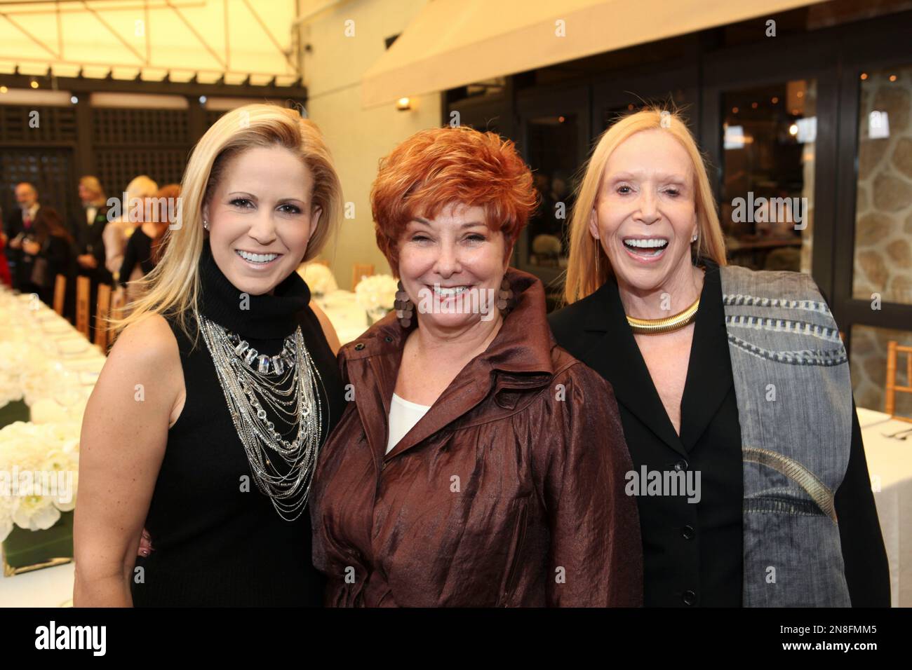 From left, Jamie Gywnn, Jerri Rosen and Lana Sills pose during a ...