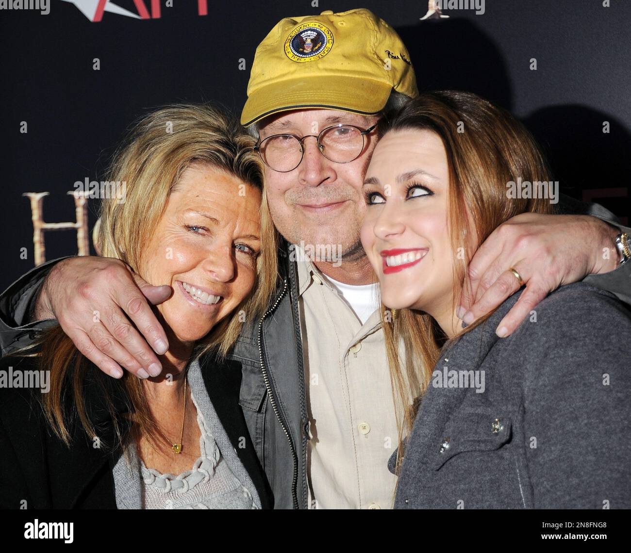 Actor Chevy Chase poses with his wife Jayni and daughter Emily at the ...