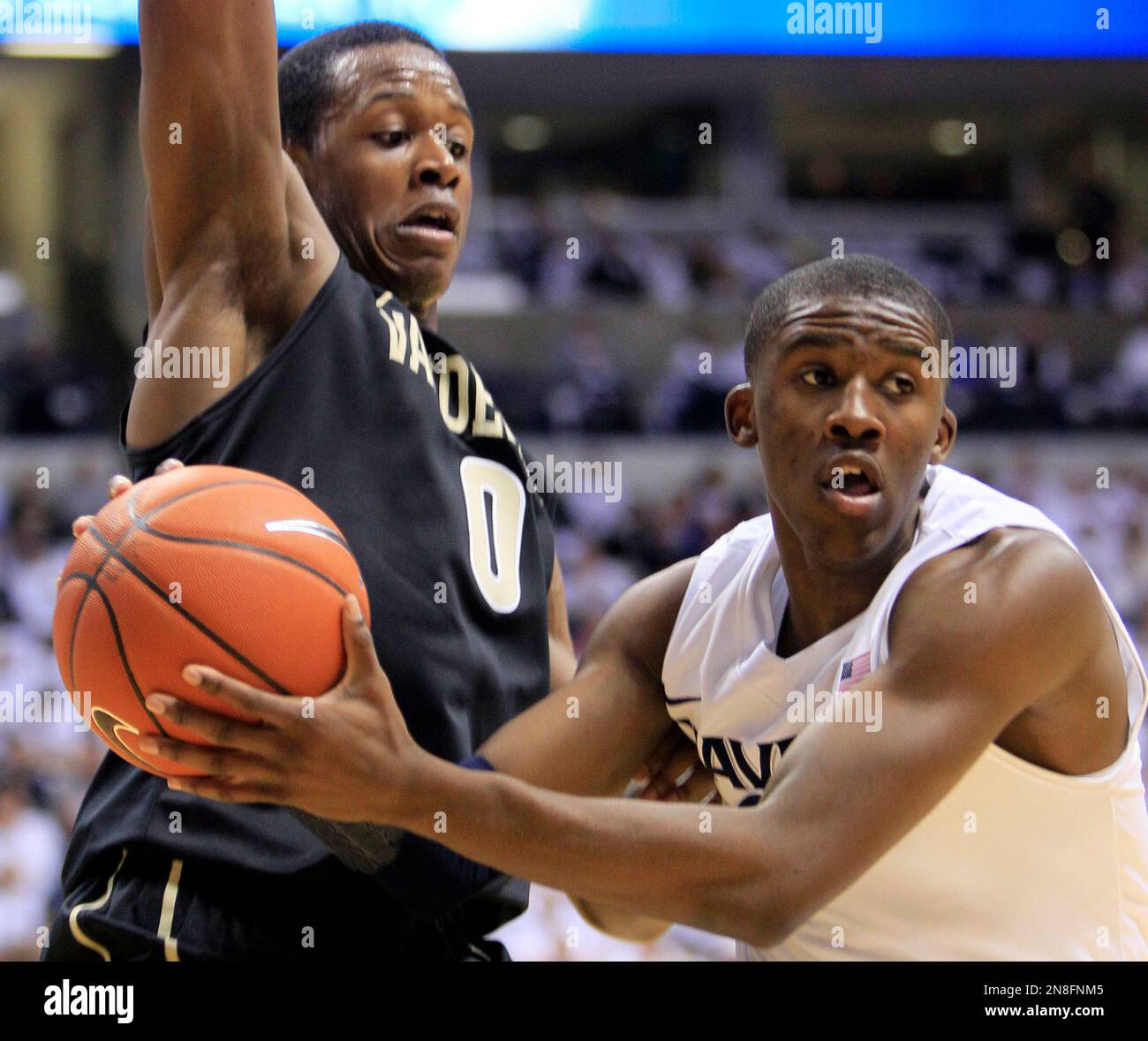 Xavier guard Semaj Christon, right, looks to pass around Vanderbilt ...