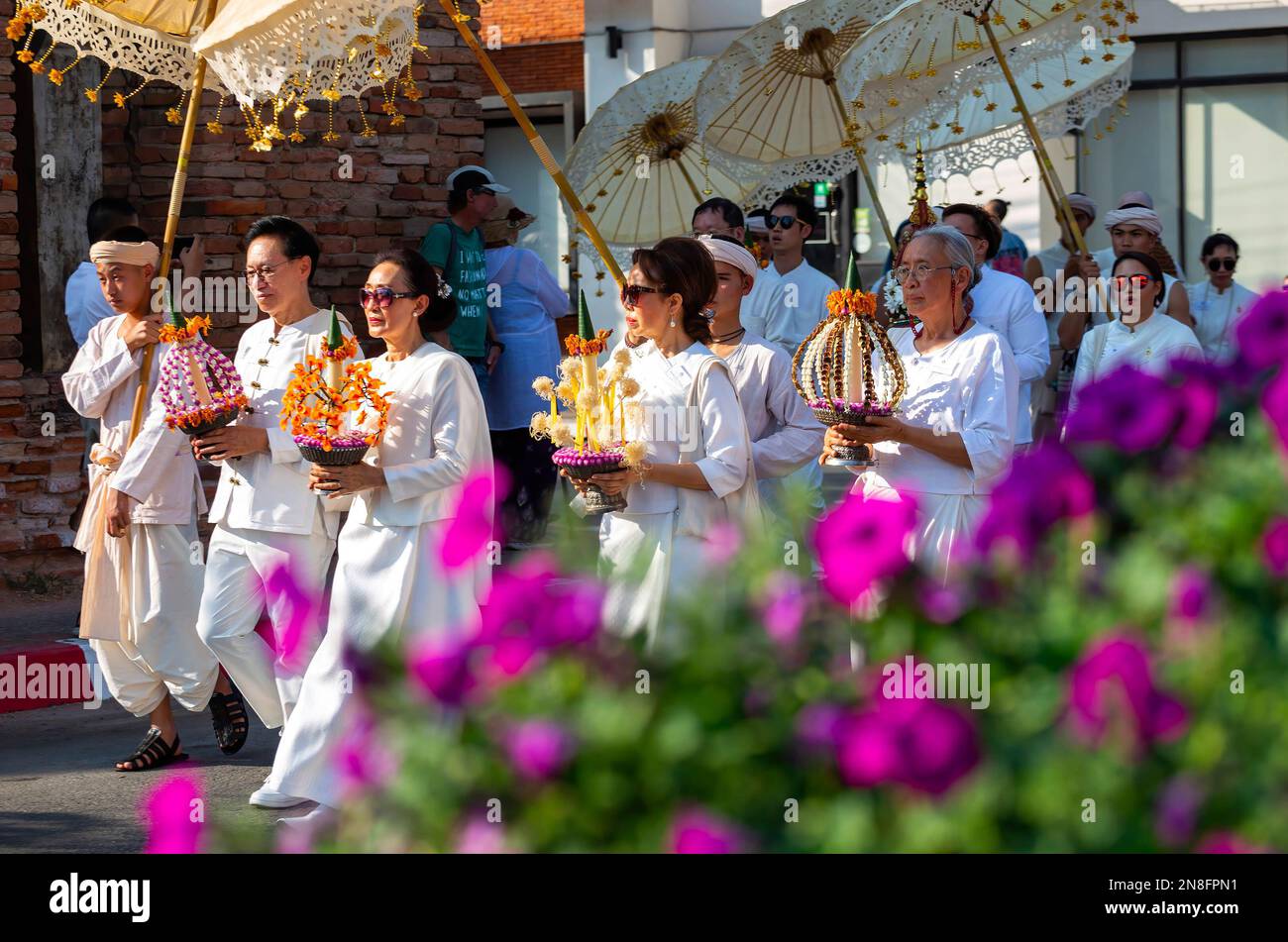 People dressed in traditional costumes during the funeral parade of ...