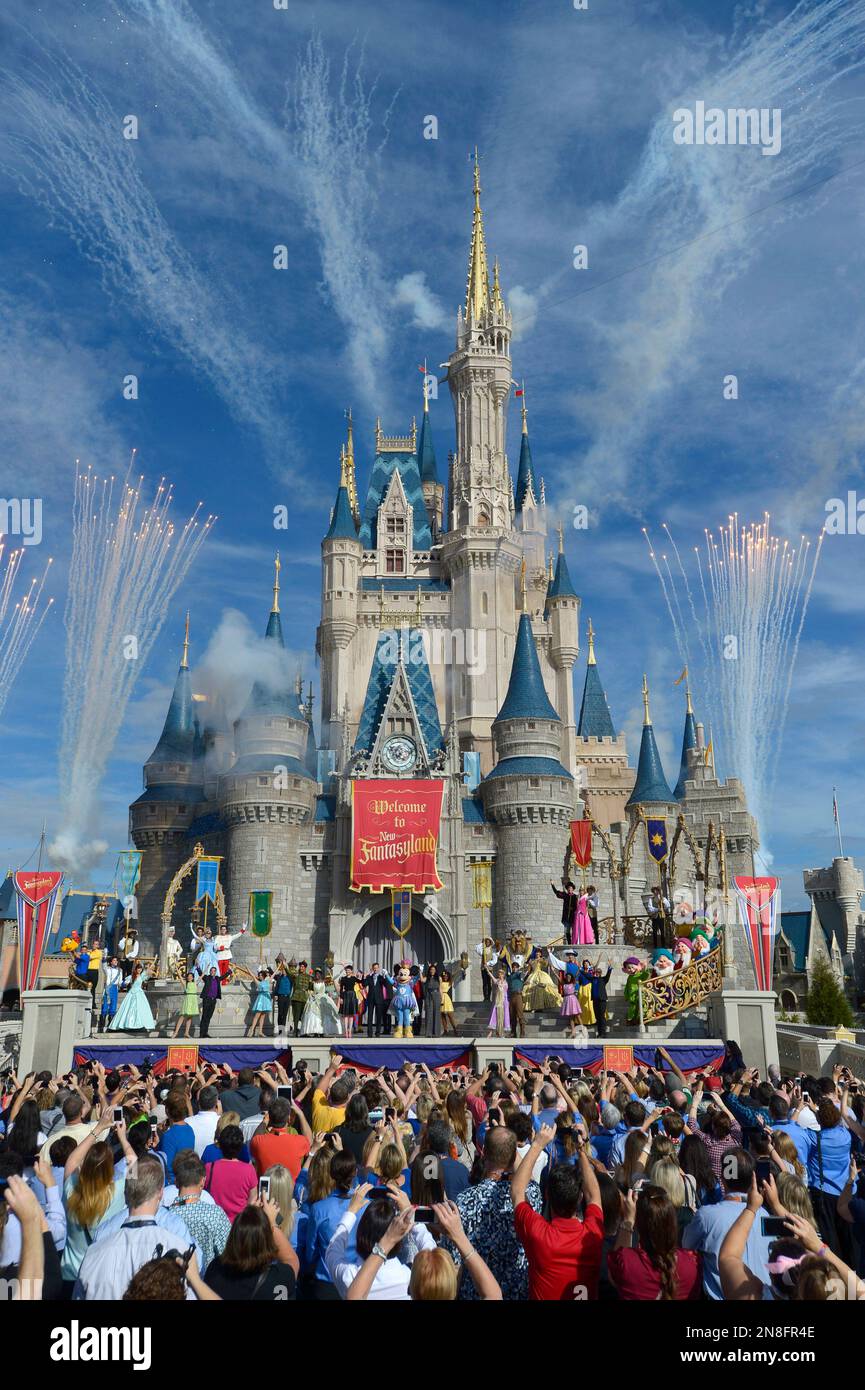 Fireworks punctuate the grand opening celebration at the Cinderella ...