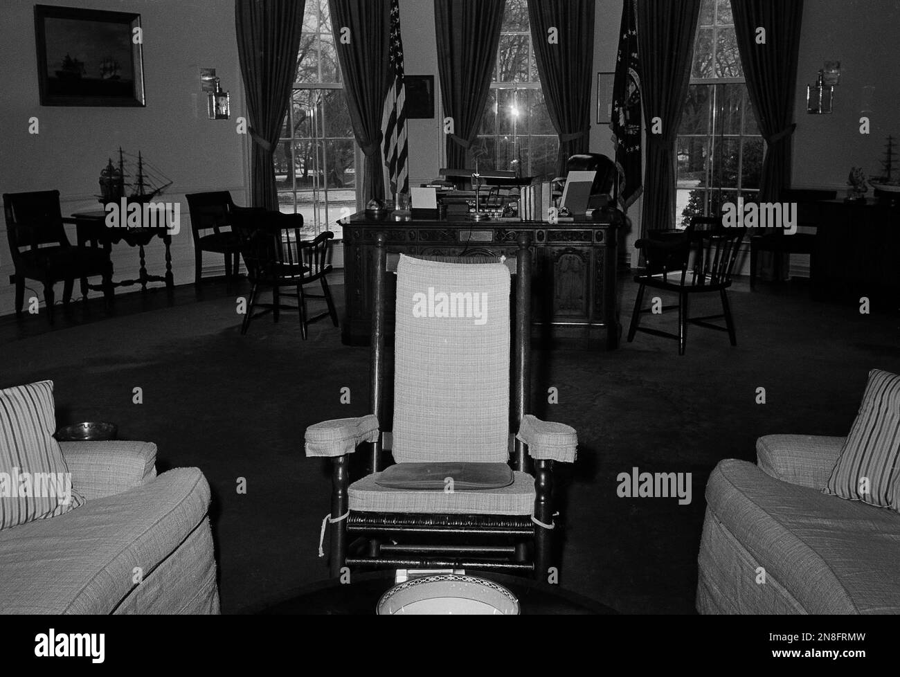 President Kennedy's rocking chair is shown in the Oval Office of the ...