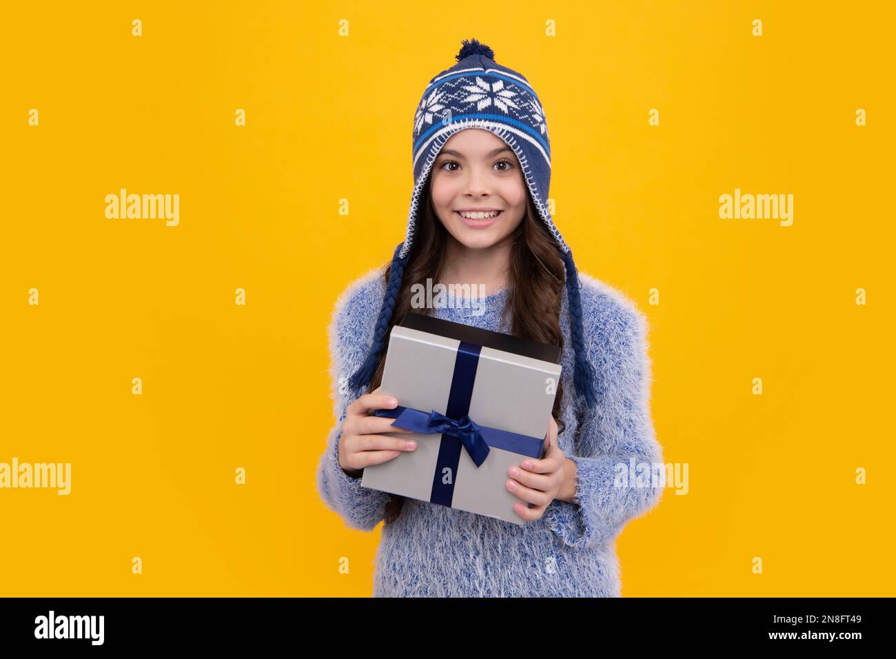 Teenager kid with present box. Teen girl giving birthday gift. Present ...