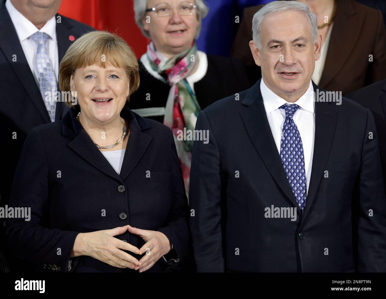 German Chancellor Angela Merkel, left, and the Prime Minister of Israel ...