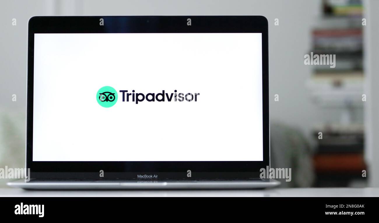 The logo of TripAdvisor, an online travel recommendation and review ...