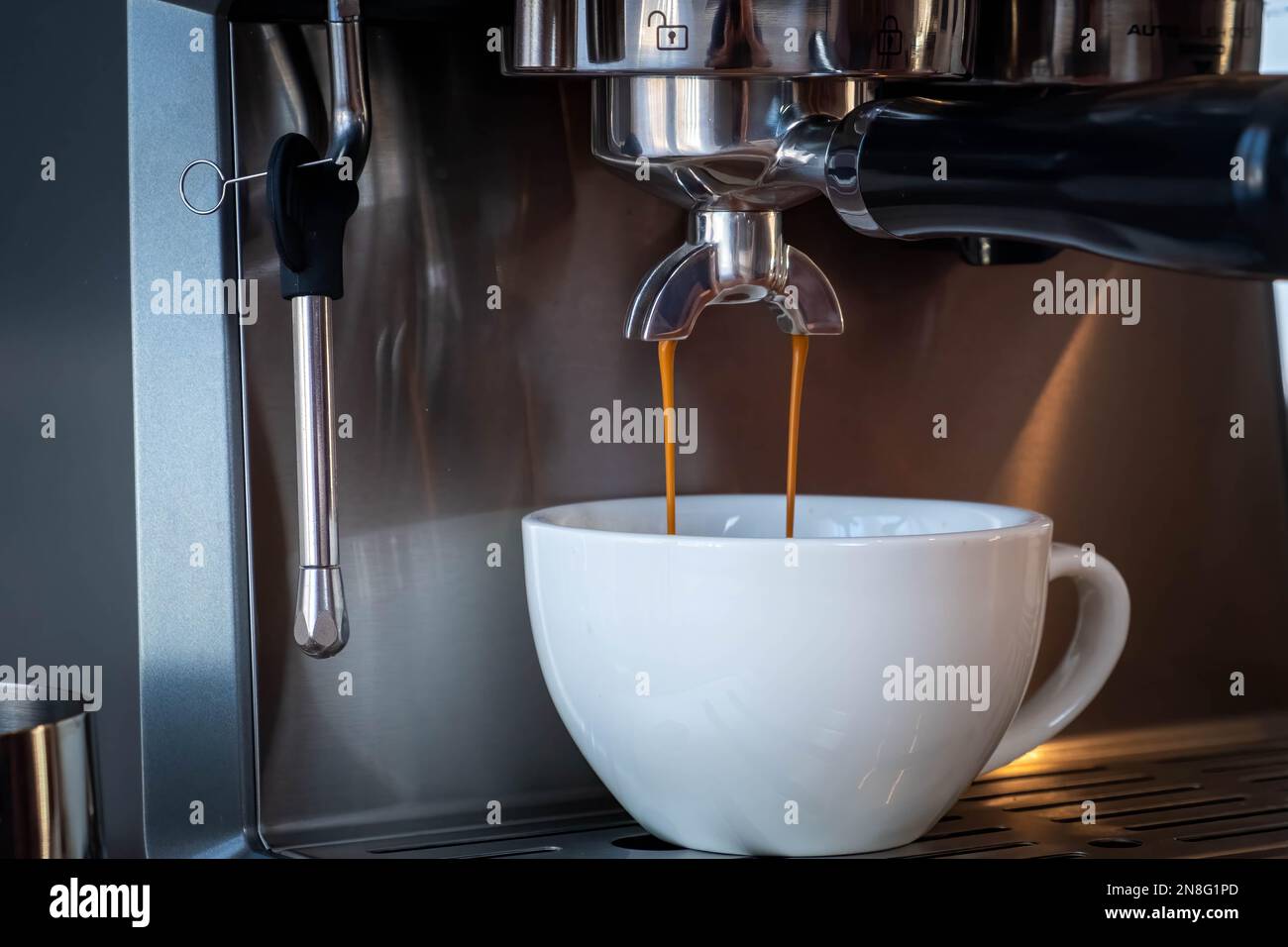 The beautiful caremel-colored flow of a healthy espresso exctraction ...