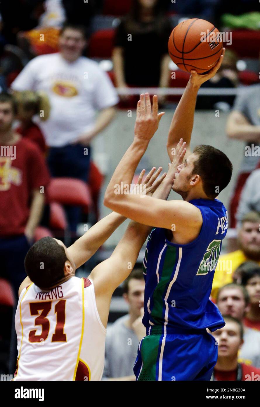Florida Gulf Coast forward Chase Fieler, right, shoots over Iowa State ...