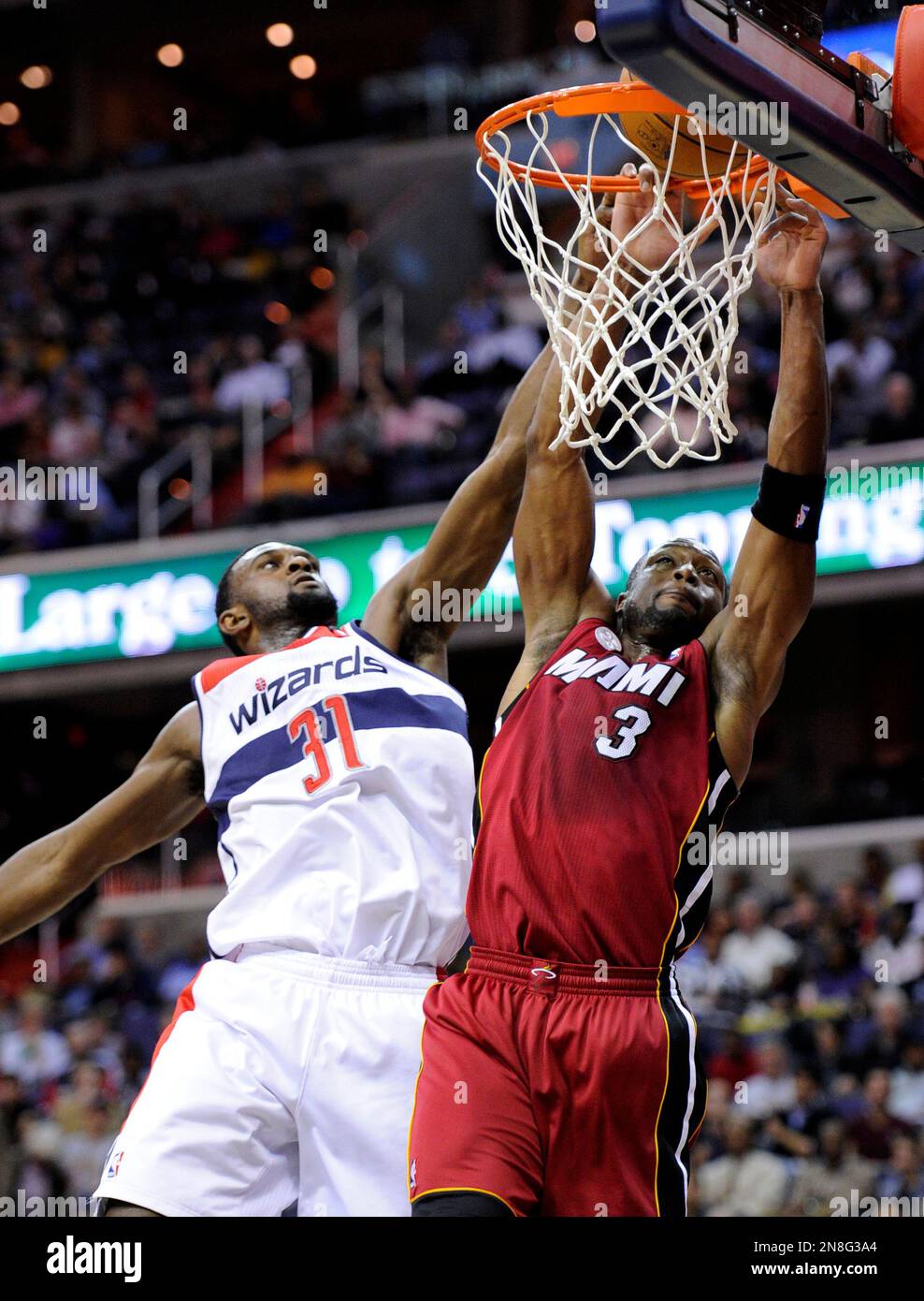 Miami Heat guard Dwyane Wade (3) goes to the basket against Washington ...