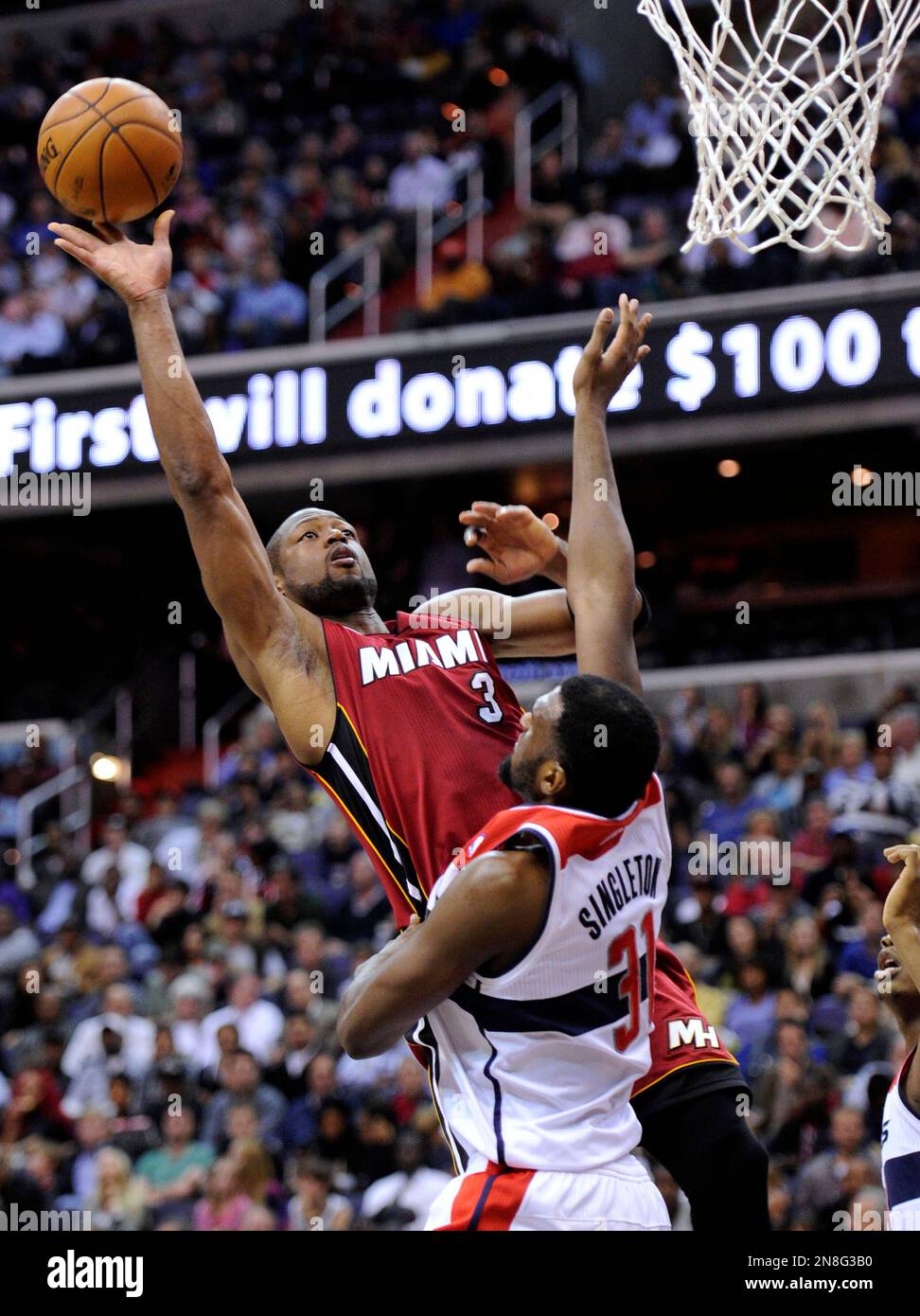 Miami Heat guard Dwyane Wade (3) takes a shot against Washington ...