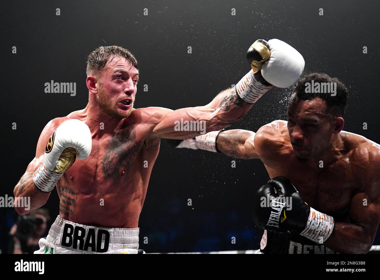 Tyler Denny (right) strikes Brad Pauls in the English Middleweight ...