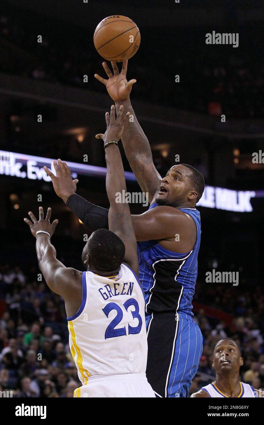 Orlando Magic forward Glen Davis, right, shoots against Golden State ...