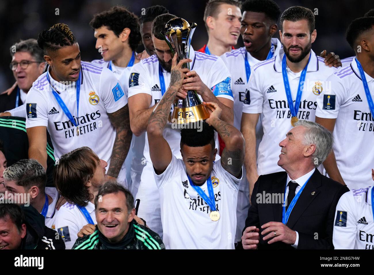 Real Madrid players celebrate with the trophy after winning the FIFA ...