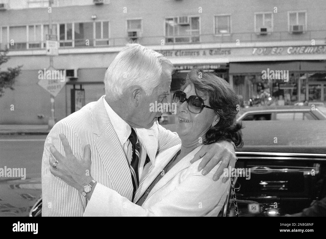 Actor Lee Marvin embraces his wife Pam as they arrive at New York's ...