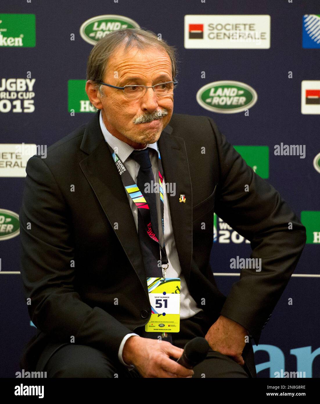 Italy rugby union team coach Jacques Brunel grimaces after the pool ...