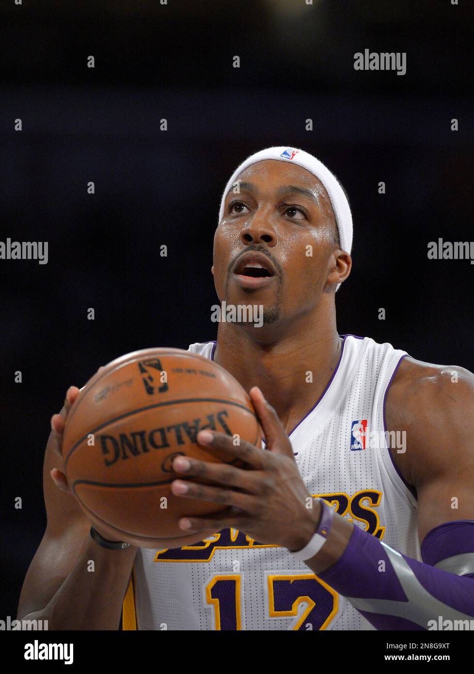 Los Angeles Lakers center Dwight Howard shoots a free throw during the ...