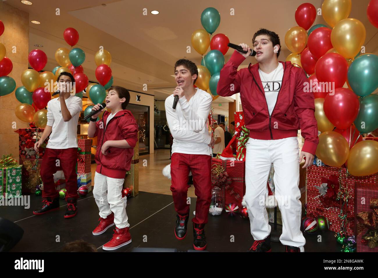 The Ochoa Brothers perform during the 3rd Annual Santa Walk fundraiser ...