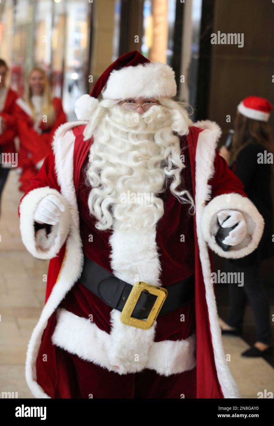 Santa walks during the 3rd Annual Santa Walk fundraiser benefiting ...