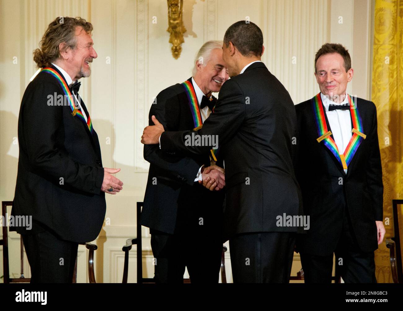 President Barack Obama, shakes hands with the 2012 Kennedy Center ...