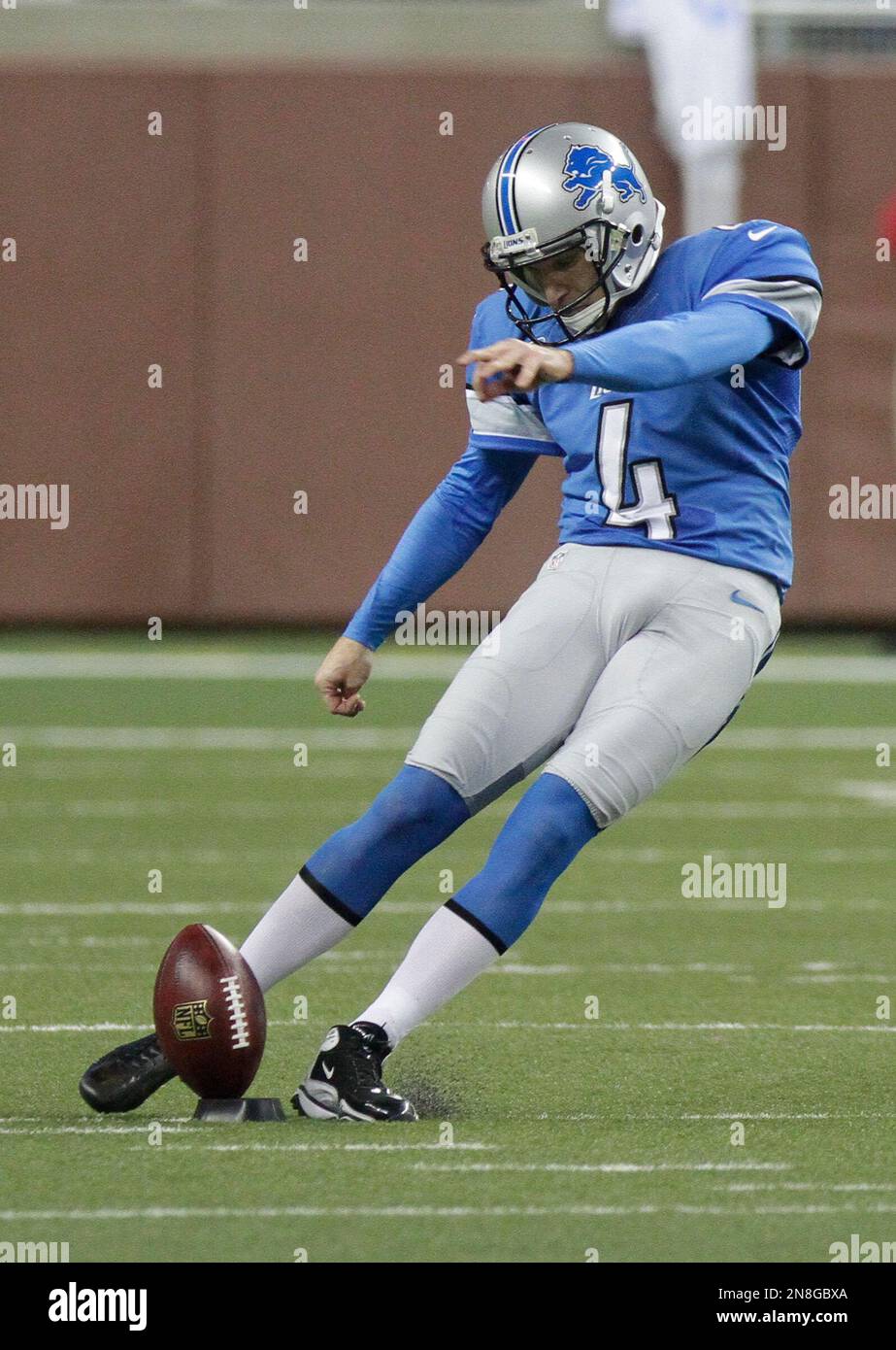 Detroit Lions kicker Jason Hanson (4) kicks off during the second ...
