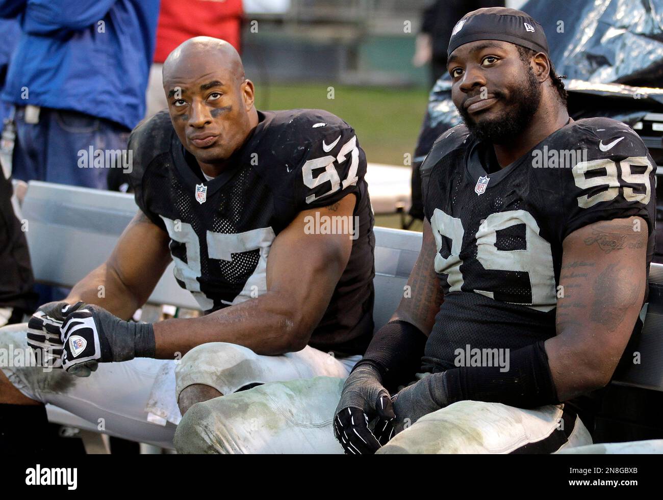 Oakland Raiders defensive end Andre Carter (97) and defensive end ...