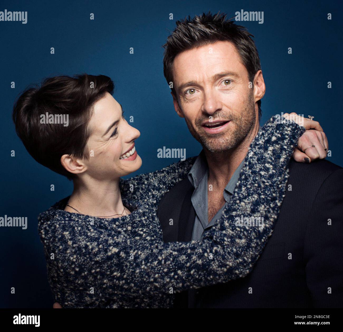 From left, co-stars of the LES MISERABLES film, Hugh Jackman and Anne ...