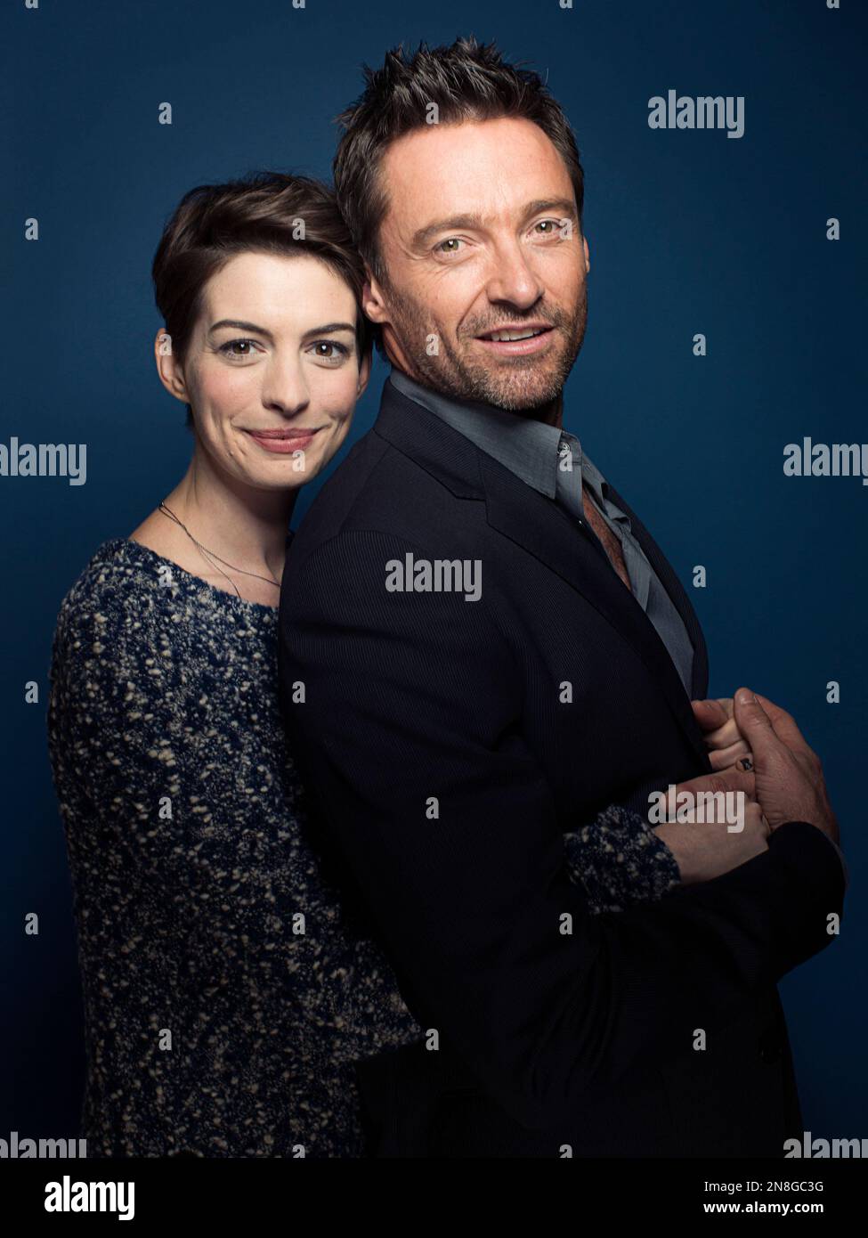 From left, co-stars of the LES MISERABLES film, Hugh Jackman and Anne ...
