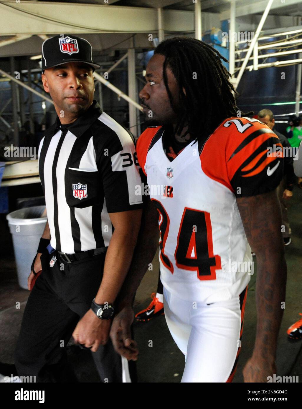 Cincinnati Bengals cornerback Adam Jones, right, looks at back judge ...