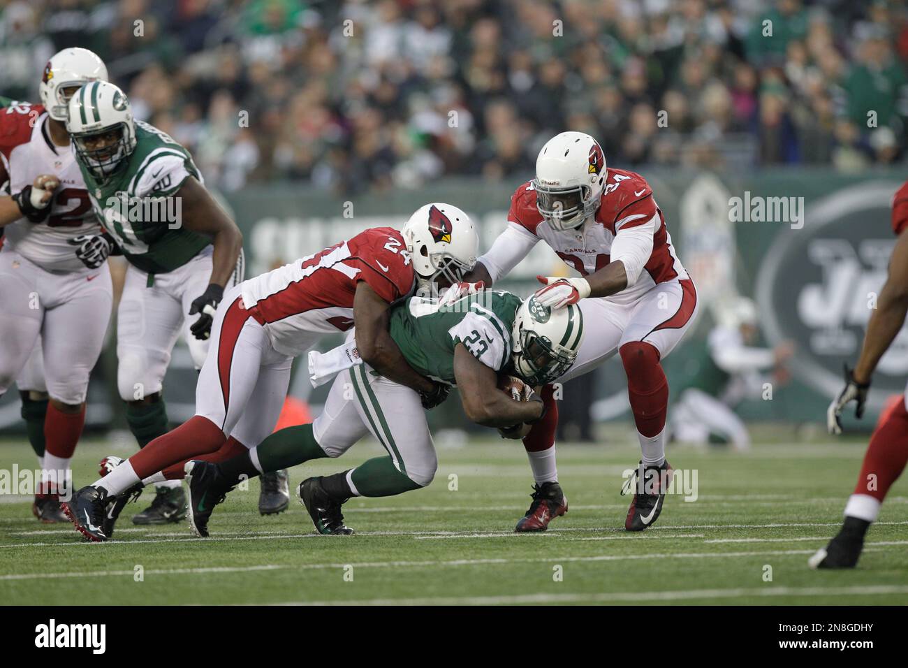 New York Jets running back Shonn Greene (23) carries the ball as ...