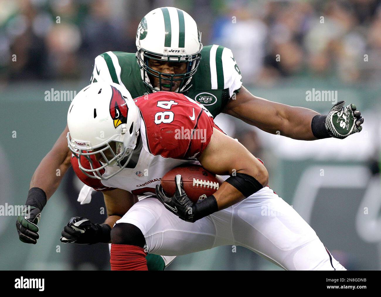 Arizona Cardinals tight end Rob Housler (84) is tackled by New York ...