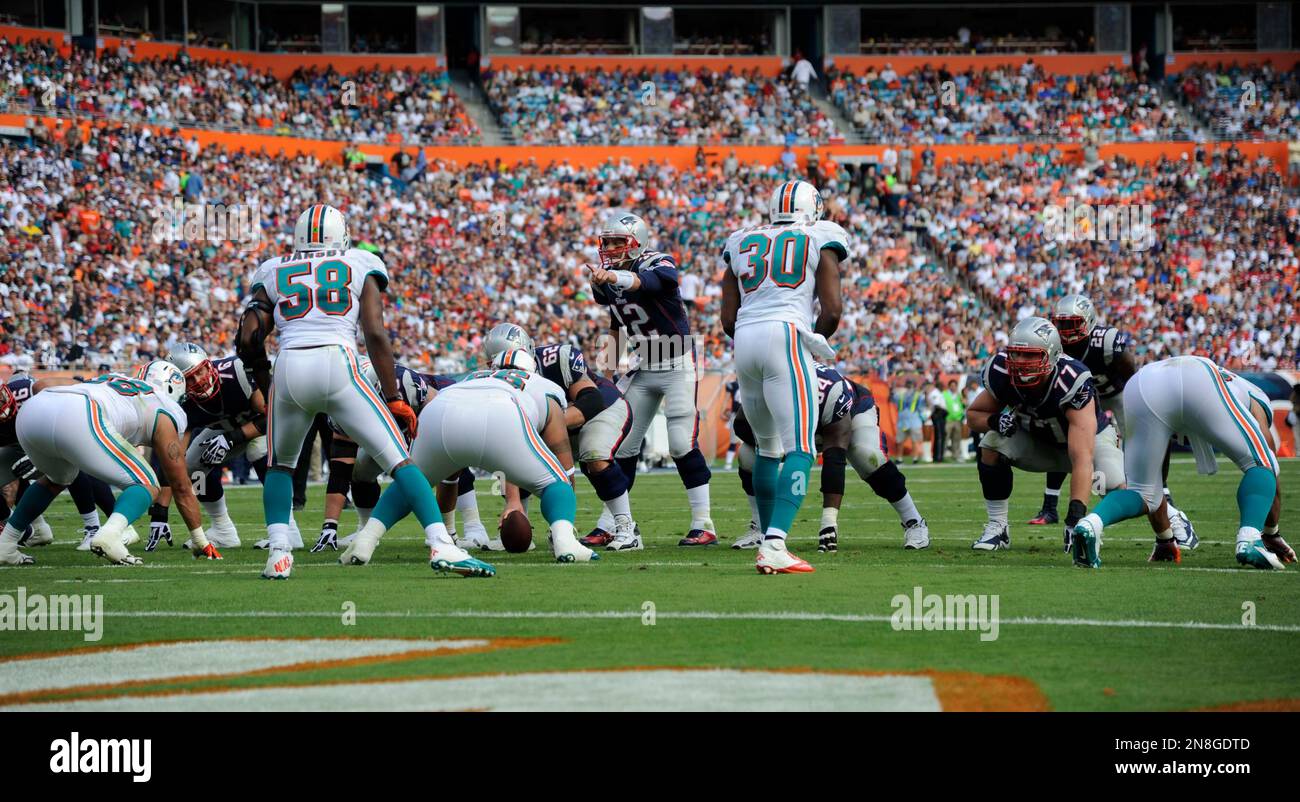 New England Patriots quarterback Tom Brady (12) calls a play during the ...