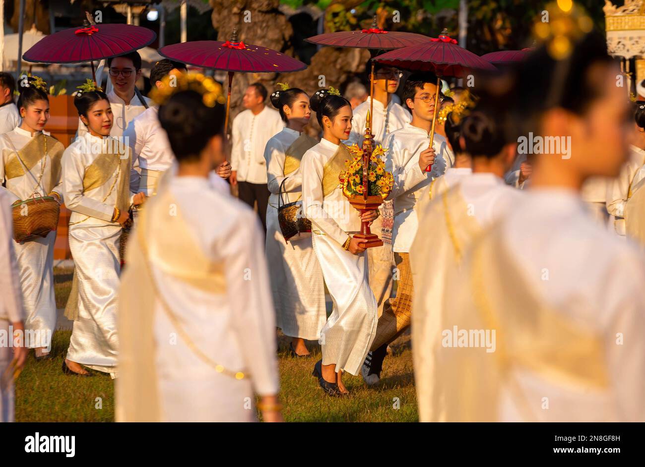 People dressed in traditional costumes during the funeral parade of ...