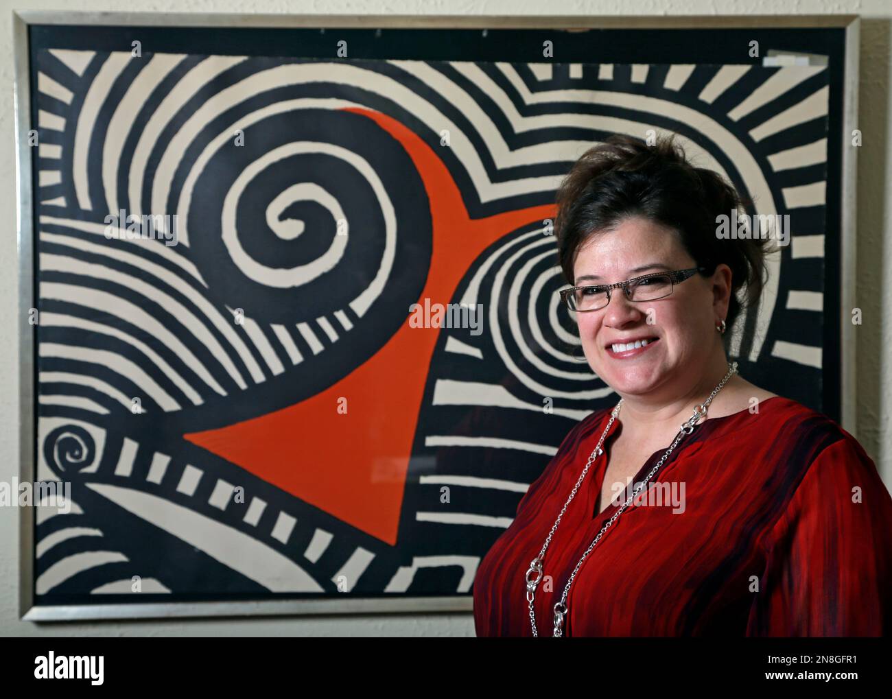 In this Wednesday, Nov. 28, 2012 photo, Karen Mallet stands in front of ...