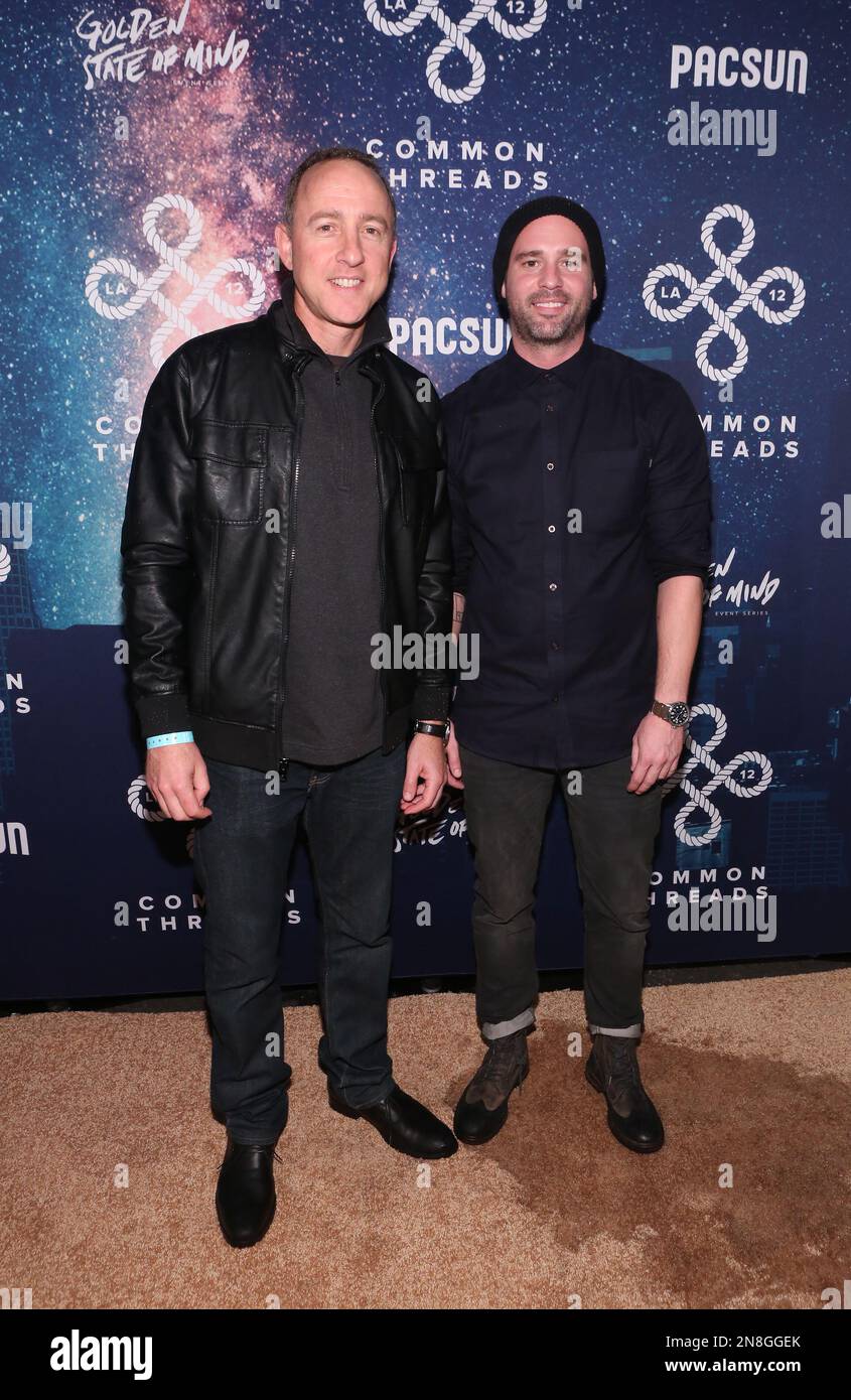 Gary Schoenfeld, CEO of PacSun and Greg Crawford pose for a photo at ...
