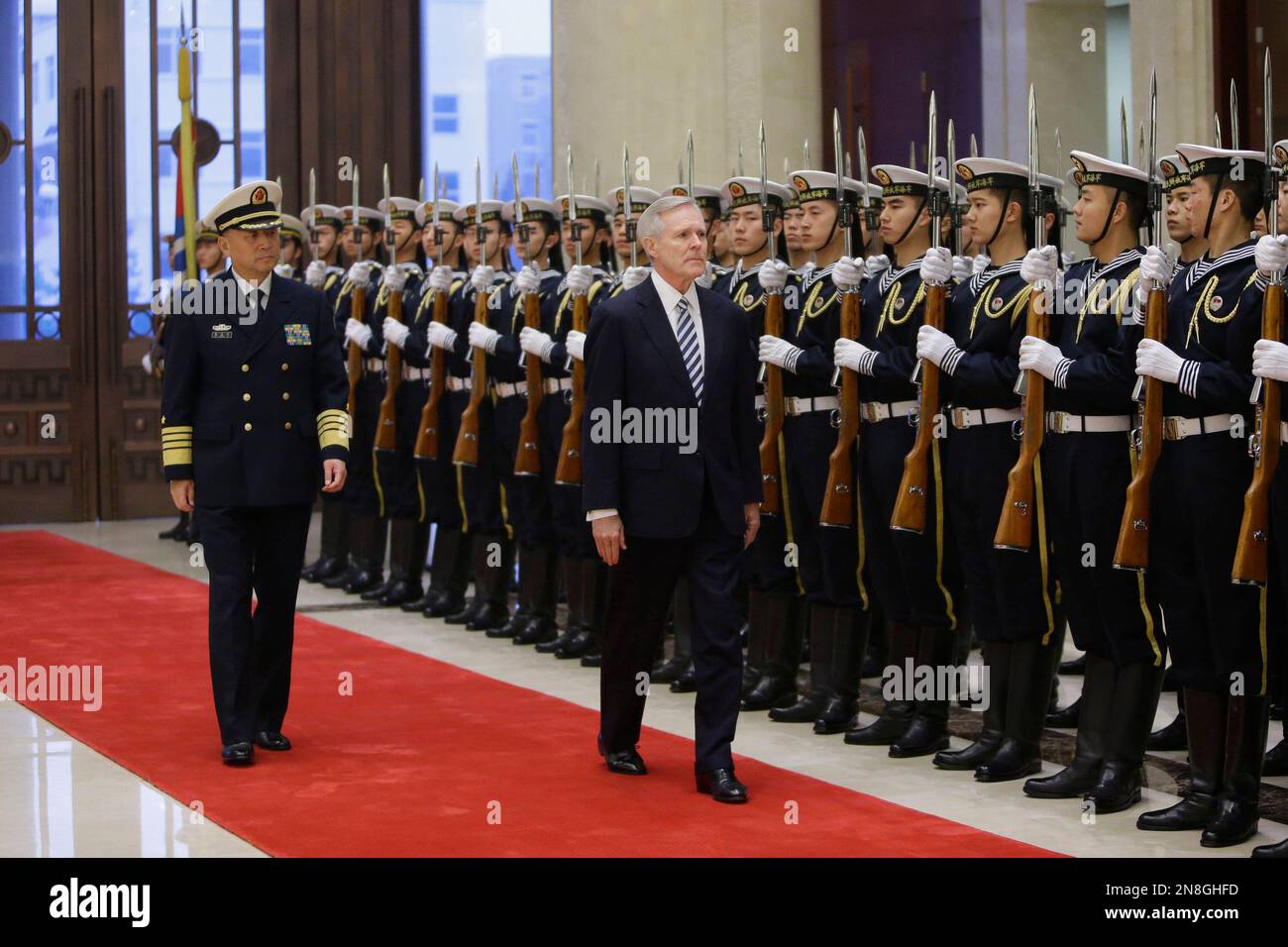 In this Nov. 27, 2012 photo, U.S. Navy Secretary Ray Mabus, center, and ...