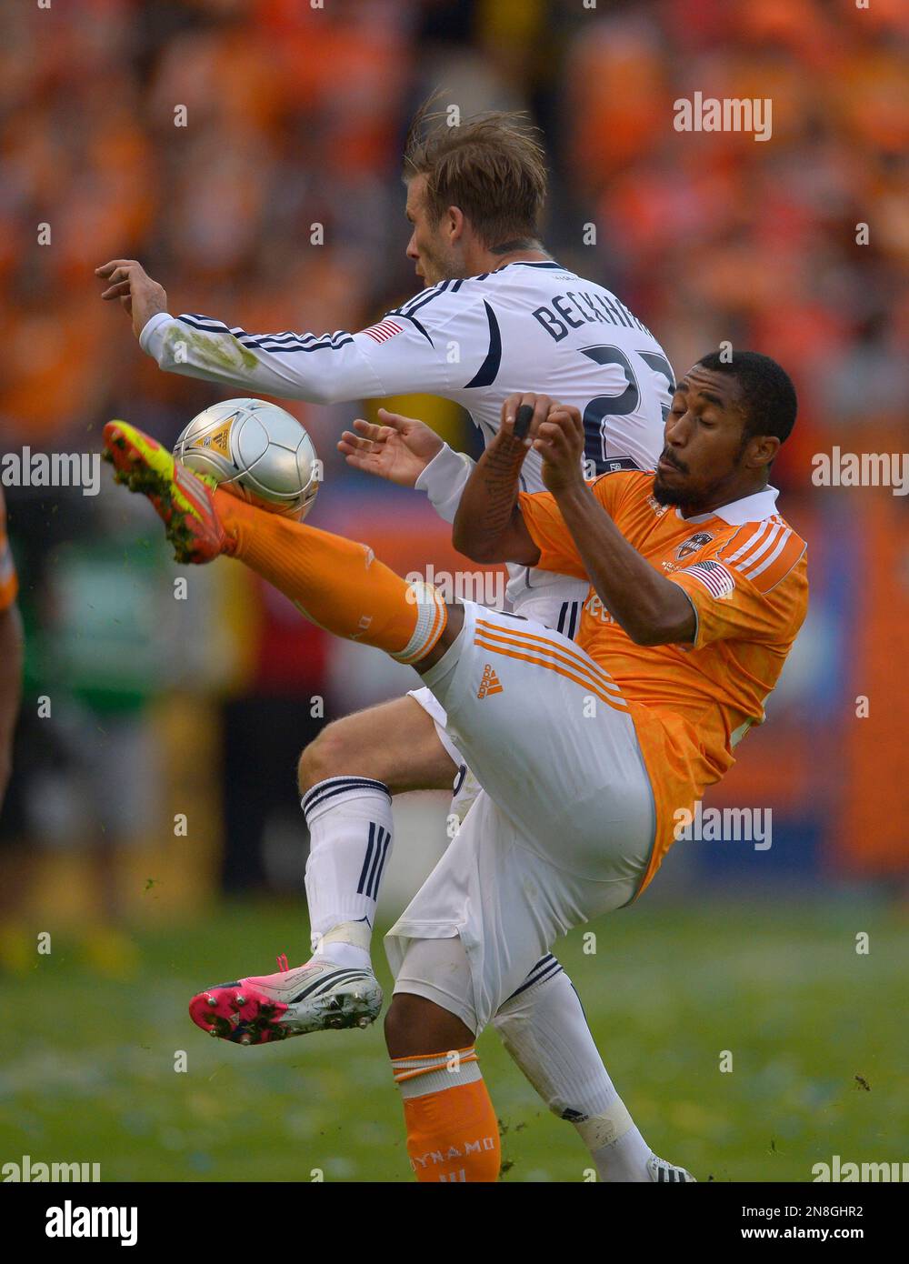 Los Angeles Galaxy midfielder David Beckham, left, and Houston Dynamo ...