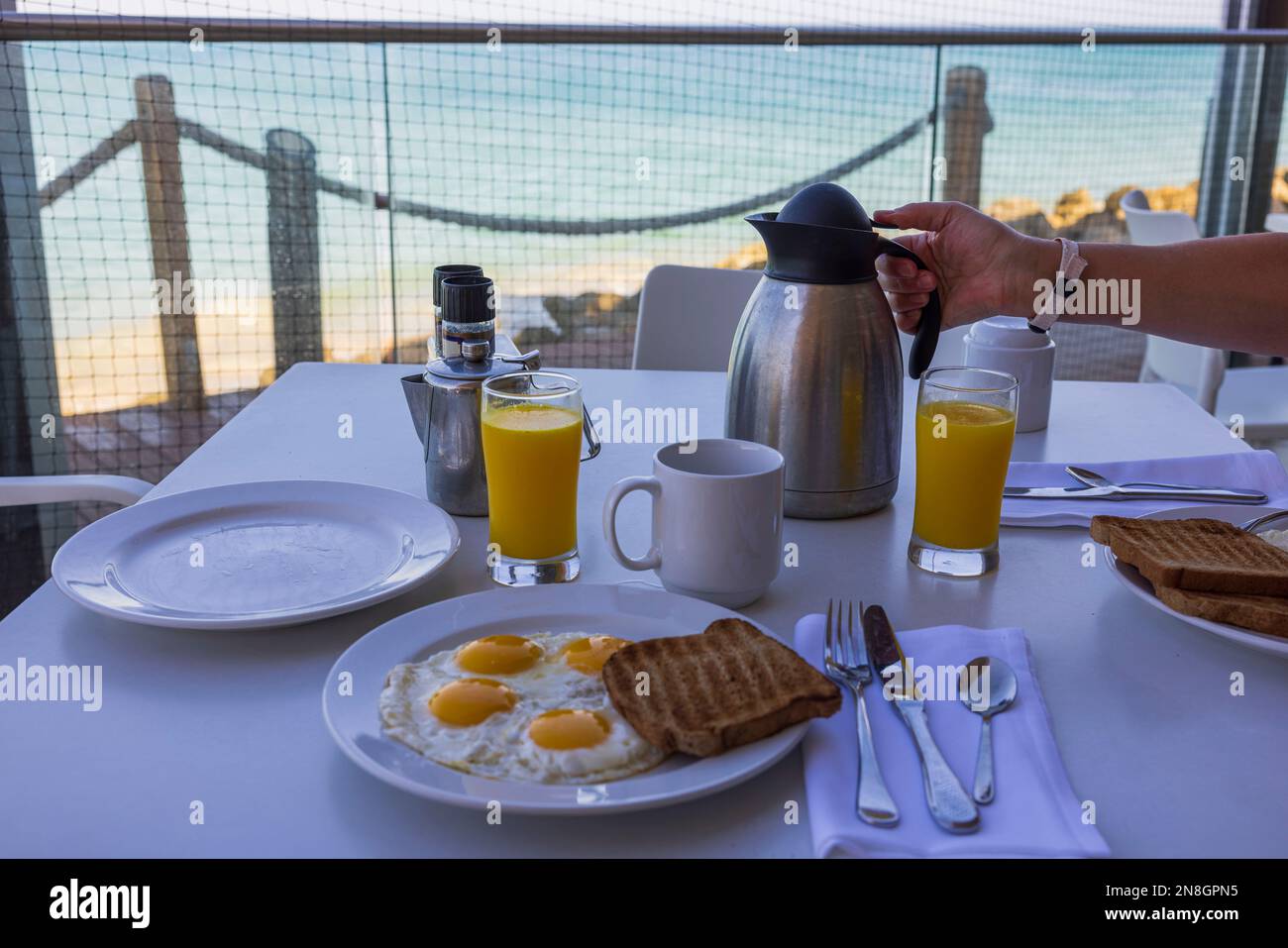 Close up view of interior of breakfast table in outdoor hotel ...