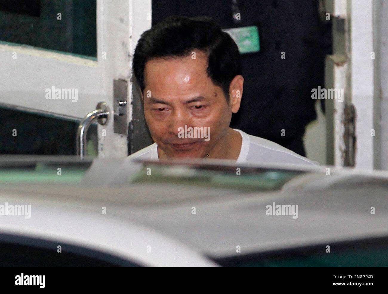 Macau crime boss Wan Kuok-koi known as Broken Tooth Koi walks out of ...