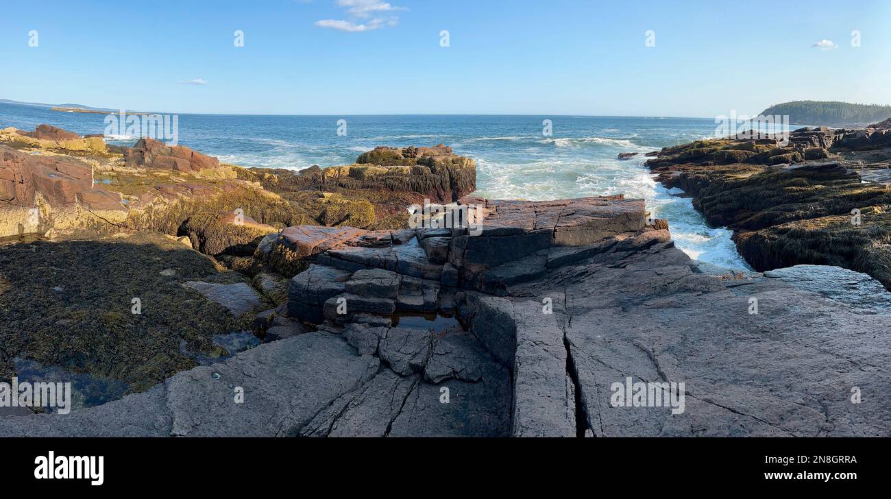 Famous Thunder Hole rocky shoreline of Acadia National park on the ...