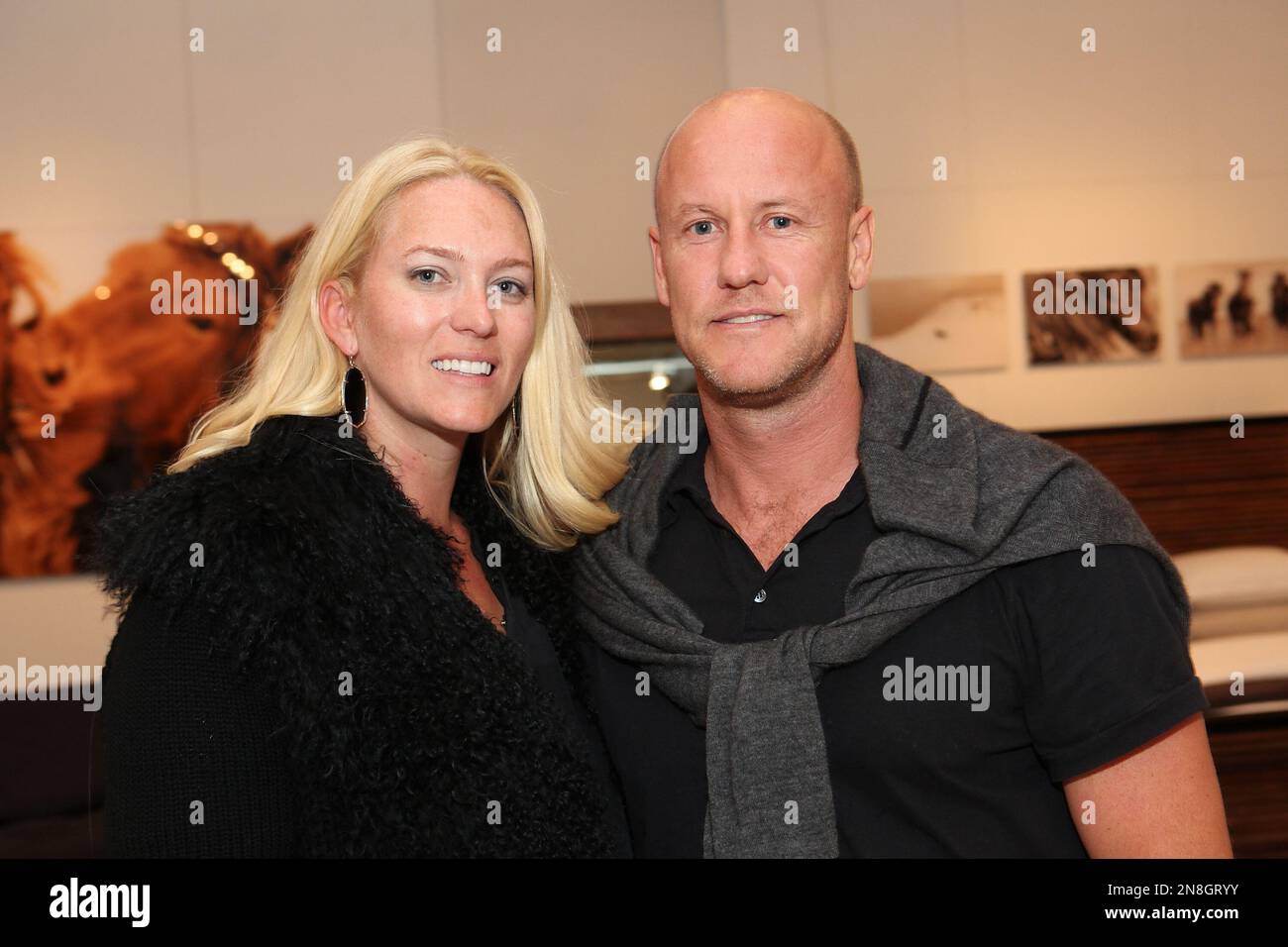 From left, Ashley Rosenhain and Geoff Rosenhain pose during a book ...